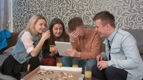 Happy Diverse Group of Friends Laughing at What They See on the Screen ...