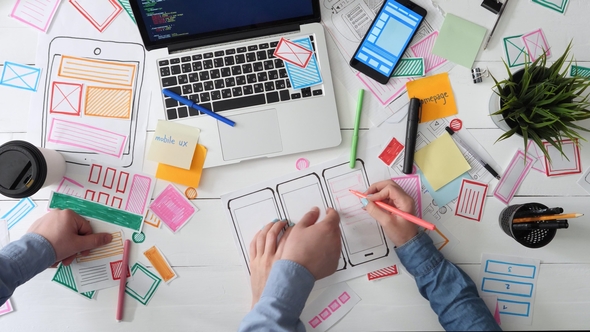 UX Designers Drawing Mobile App Layout, Stock Footage | VideoHive