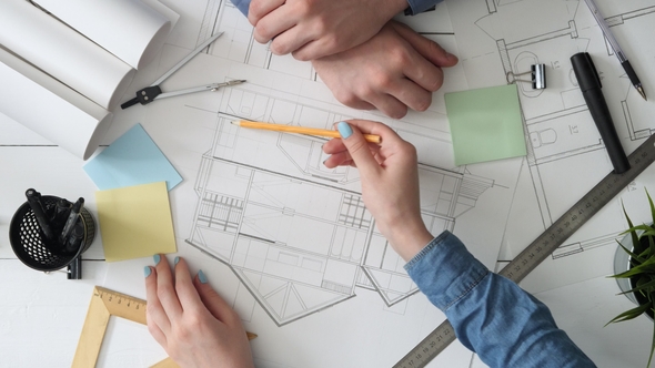 Architect Showing House Sketch To a Client, Stock Footage | VideoHive