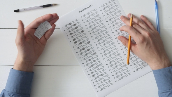 Student Using Crib During Exam, Stock Footage | VideoHive