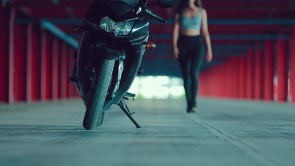 Motorcycle. Walking Girl in the Background, Stock Footage | VideoHive