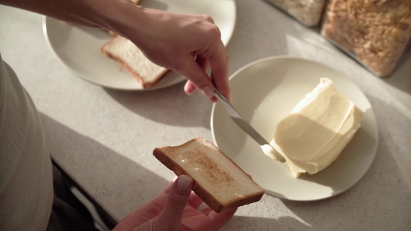 Toast With Butter. Hands Applying Butter On Bread, Stock Footage ...