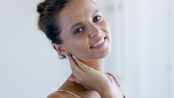 Cheerful Female Touching Neck, Stock Footage | VideoHive
