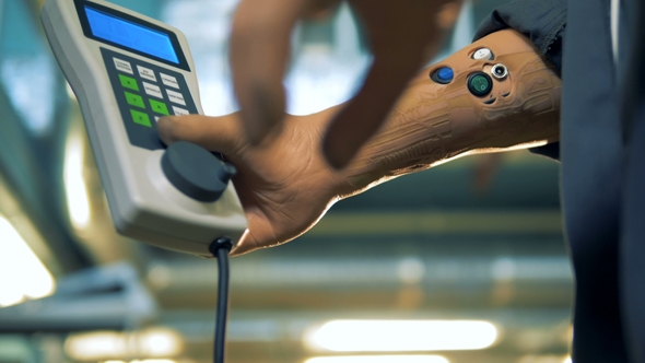 Male Worker Is Manipulating a Milling Machine's Remote Control with His ...