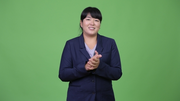 Happy Overweight Asian Businesswoman Clapping Hands, Stock Footage