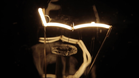 Light Bulb. Filament Gradually Turns on and Off, Stock Footage | VideoHive