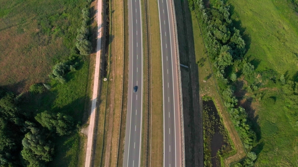 Aerial Vertical Shot. Cars Driving By the Road. Traffic on the Highway ...