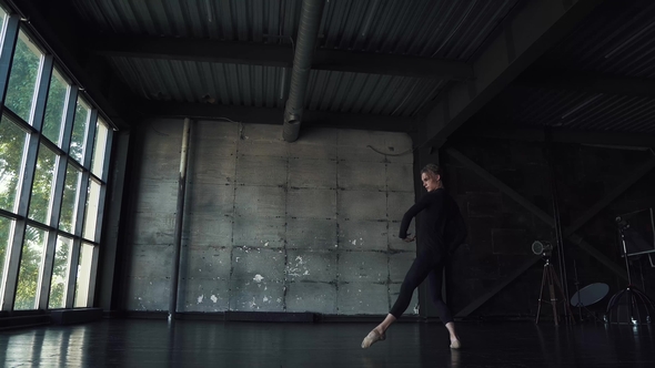 Male Ballet Dancer Dancing Classical Ballet in a Dark Studio, Stock Footage