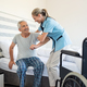 Nurse helping old patient get up Stock Photo by Rido81 | PhotoDune