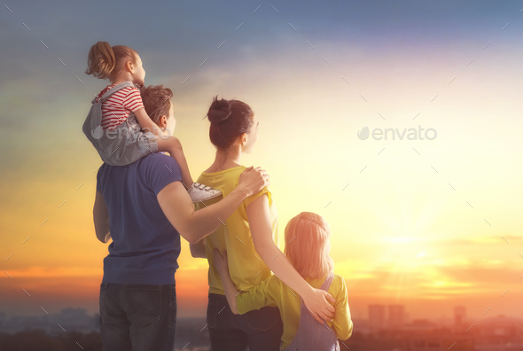 happy family at sunset Stock Photo by choreograph | PhotoDune