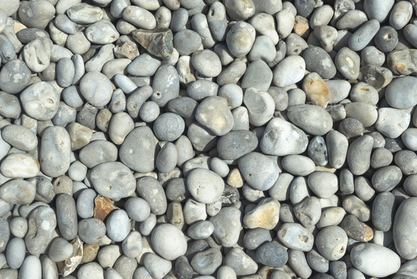 All rounded tiny pebbles from beach a natural summer background smooth ...