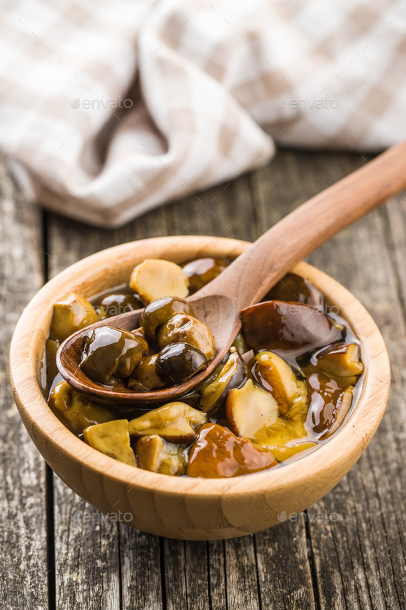 Pickled mushrooms. Marinated boletus. Stock Photo by jirkaejc | PhotoDune