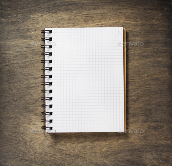 checked notebook at wood Stock Photo by seregam | PhotoDune