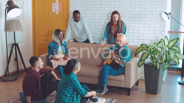Group of Friends Play Guitar Together and Sing Songs, Stock Footage
