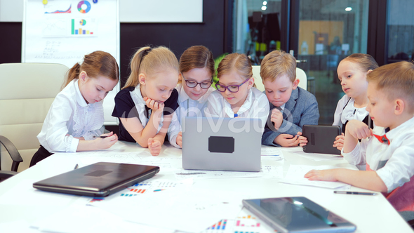 Office and the Concept of Teamwork a Group of Business Children at a ...