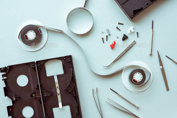Flat lay vhs video cassette parts on pastel blue background Stock Photo ...