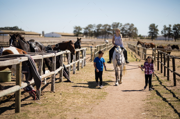 Kids riding a horse in the ranch Stock Photo by Wavebreakmedia | PhotoDune