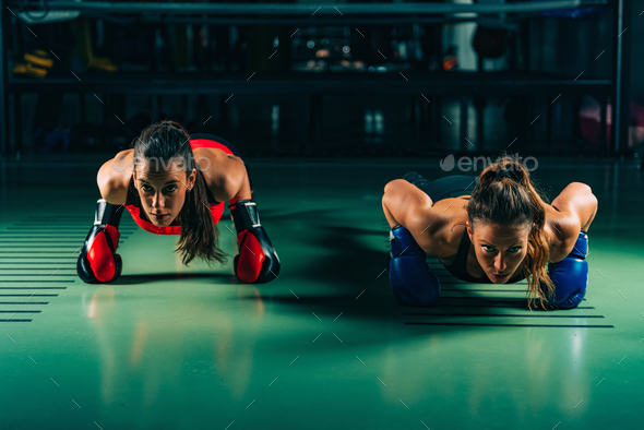 Women on boxing training Stock Photo by microgen | PhotoDune