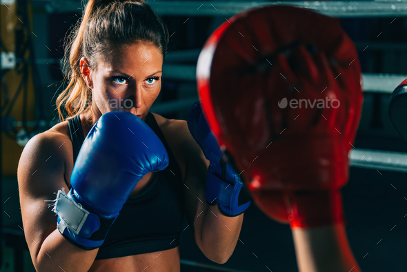 Women on boxing training Stock Photo by microgen | PhotoDune