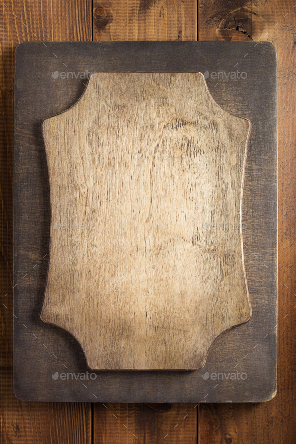 dark sign board at wooden background Stock Photo by seregam | PhotoDune