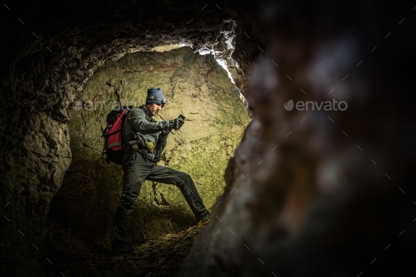 Deep Cave Exploration by Men Stock Photo by duallogic | PhotoDune