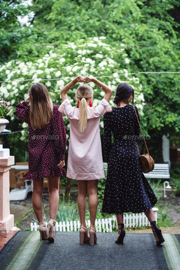 Three girls posing on camera Stock Photo by simbiothy | PhotoDune