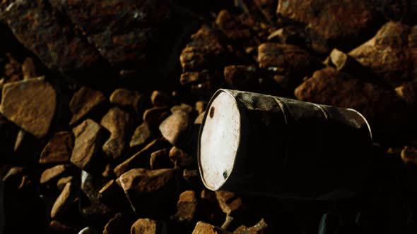 Rusty Destroyed Metal Barrel on Beach Rocks, Motion Graphics | VideoHive