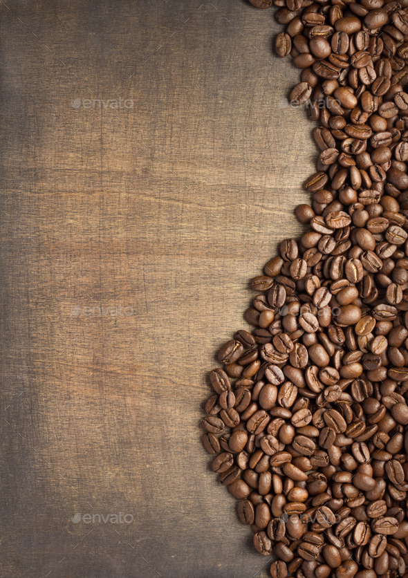 coffee beans on wooden background Stock Photo by seregam | PhotoDune
