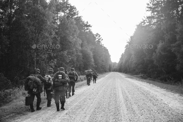 German Infantry Soldier In World War II Marching Walking Along F Stock ...