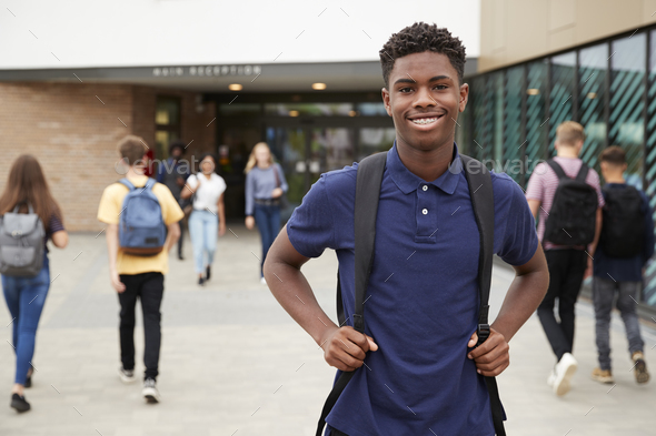 Portrait Of Smiling Male High School Student Outside College Building ...