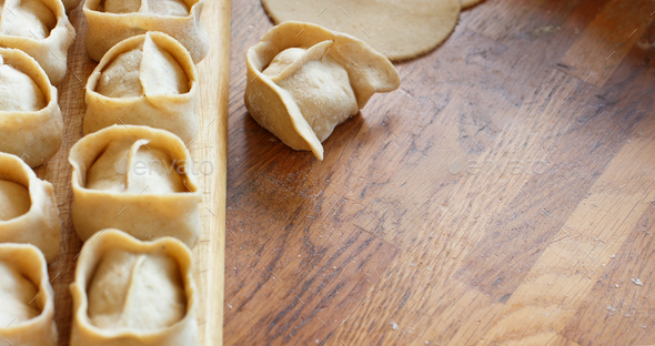 Preparation of dumplings manti Stock Photo by katrinshine | PhotoDune