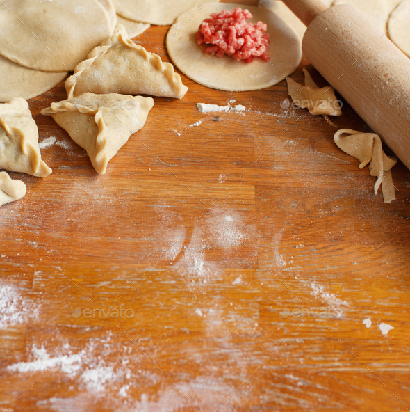 Preparation of dumplings manti Stock Photo by katrinshine | PhotoDune