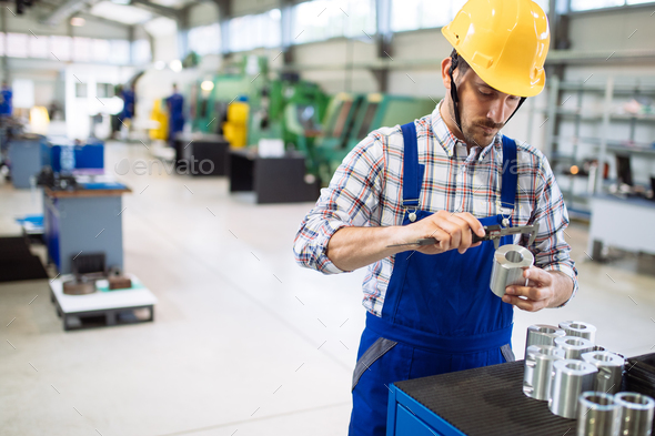 Supervisor doing quality control and pruduction check in factory Stock ...