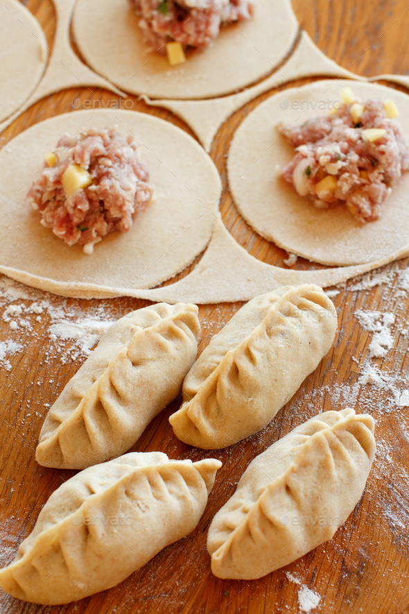 Making dumplings manti Stock Photo by katrinshine | PhotoDune
