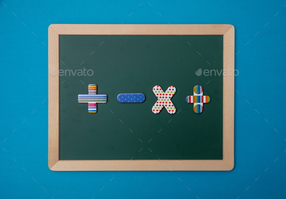 Green chalkboard with wooden frame, colorful math operation signs Stock ...