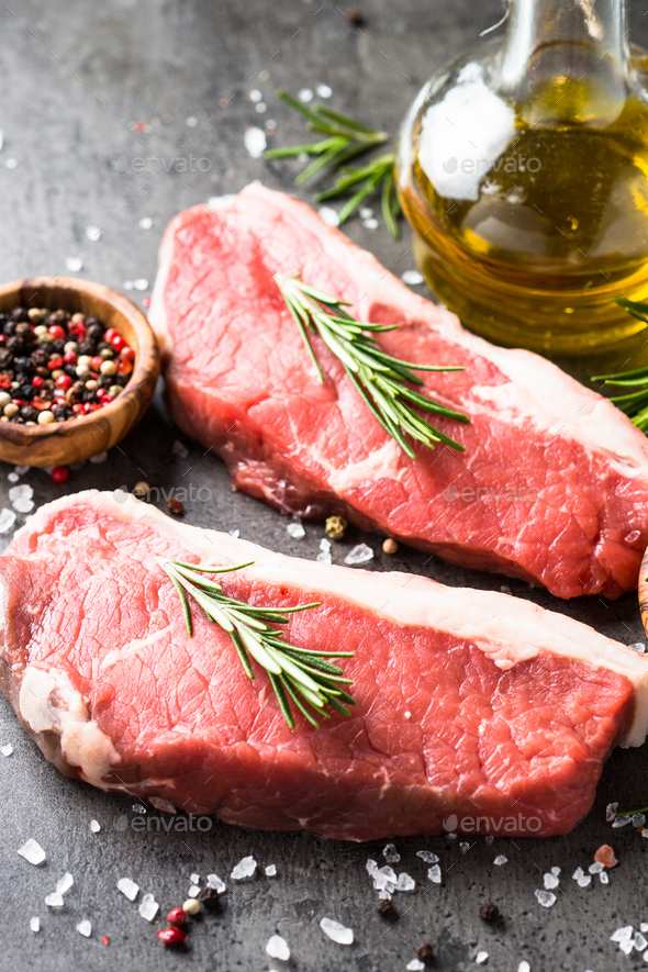 Raw beef striploin steak. Stock Photo by Nadianb | PhotoDune