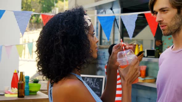 Romantic couple sharing juice, Stock Footage | VideoHive