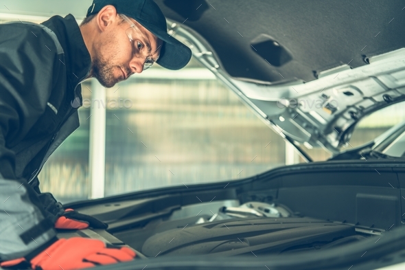 Mechanic Spotting Problem Stock Photo by duallogic | PhotoDune