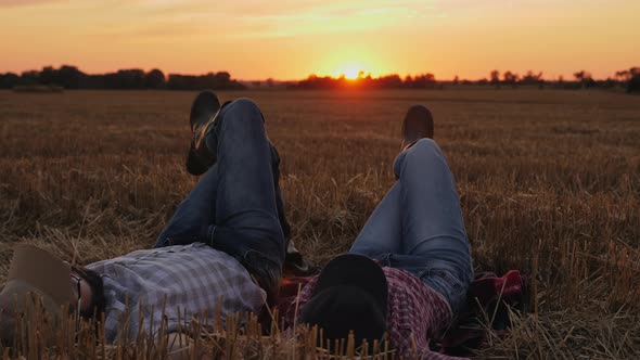 Farmers Are Resting Lying in the Field After Harvest, Stock Footage