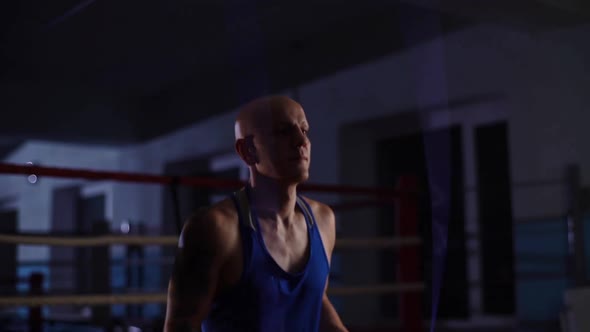 Medium Shot of Sporty Bald Male Boxer Exercising with Skipping Rope ...