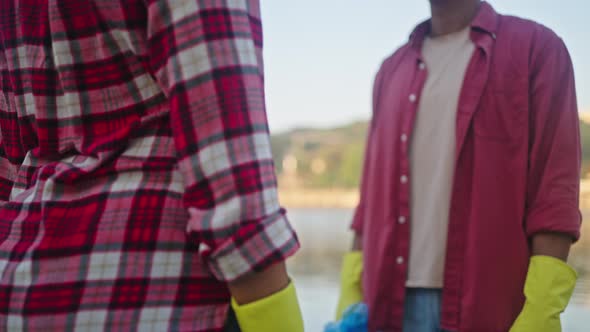 African American Volunteers Prepare to Clean River Bank, Stock Footage
