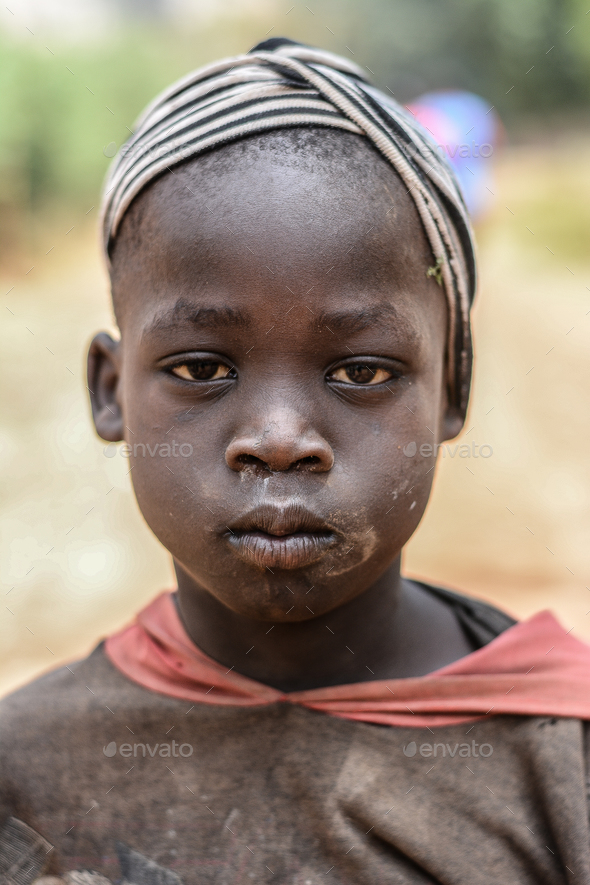 Potrait of an African boy Stock Photo by dazzlejam | PhotoDune