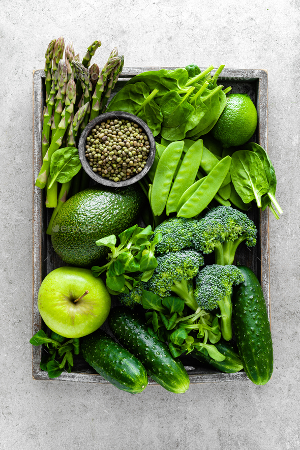 Healthy vegetarian green food concept background Stock Photo by sea_wave