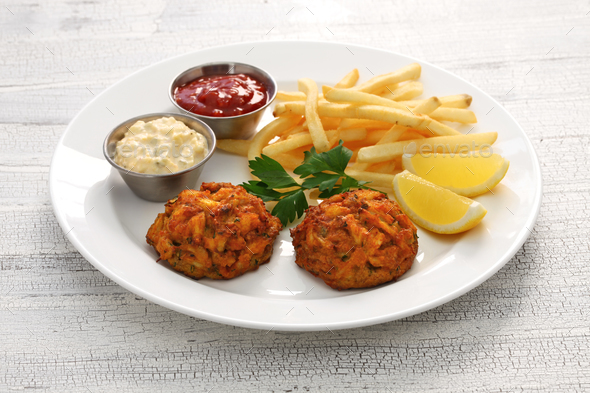 homemade maryland crab cakes plate Stock Photo by motghnit | PhotoDune