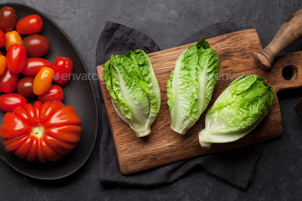 Mini romaine lettuce salad and tomatoes Stock Photo by karandaev ...