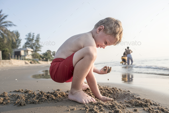 A little boy playing in the sand Stock Photo by Rawpixel | PhotoDune