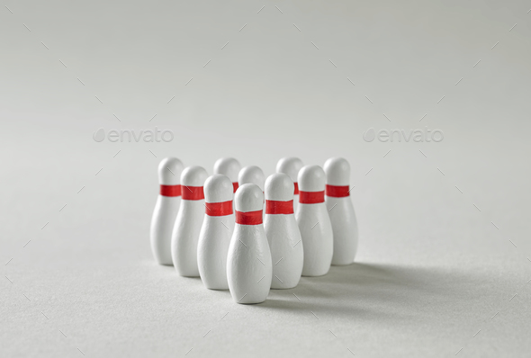 bowling pins on grey background Stock Photo by magone | PhotoDune