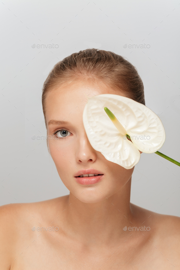 Portrait of young beautiful woman without makeup covering eye wi Stock ...
