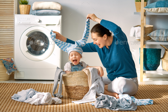 family doing laundry Stock Photo by choreograph | PhotoDune