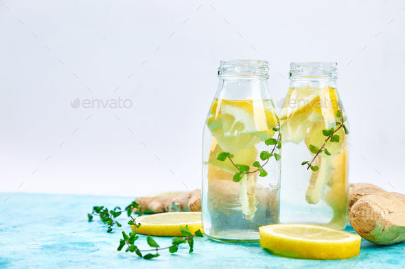 Detox water in bottles with ingredients, ginger, lemon, mint Stock ...